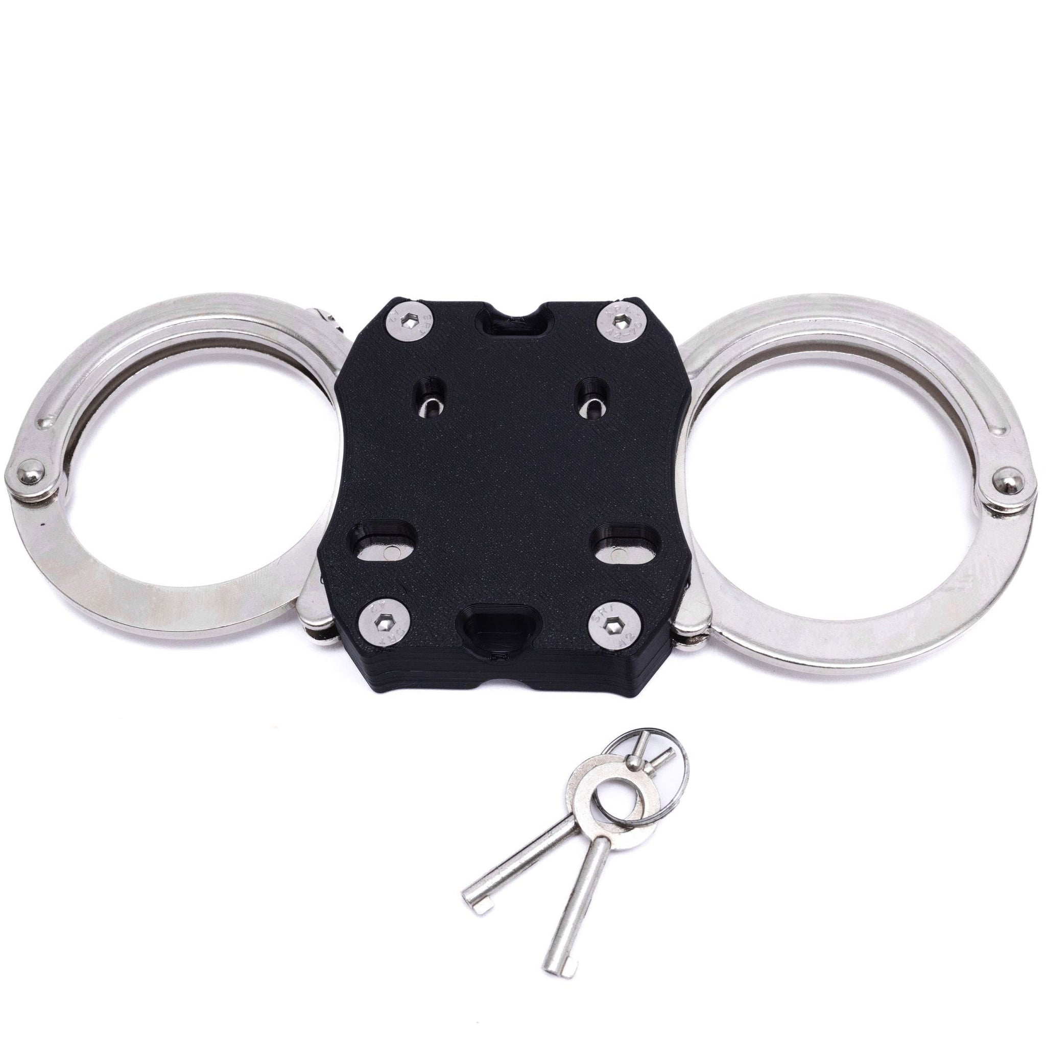 Hinged handcuffs, rigid design with two keys